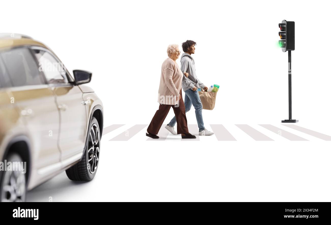 Helping elderly lady carry bags hi-res stock photography and images - Alamy