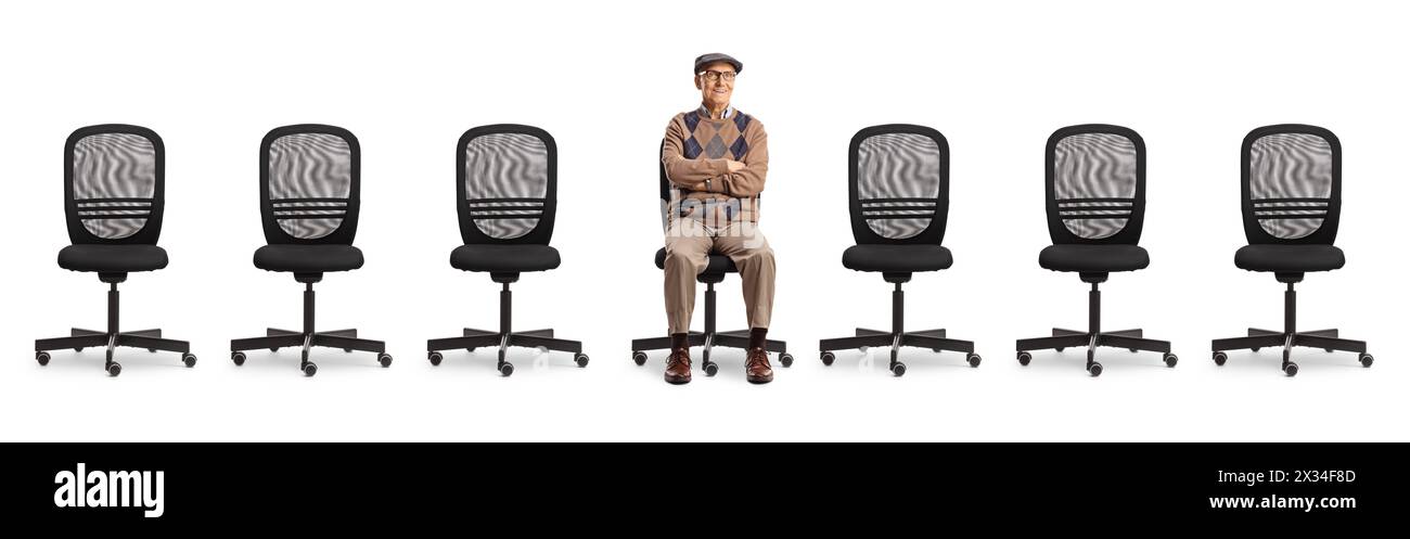 Elderly man sitting in an office chair with other empty chairs around ...