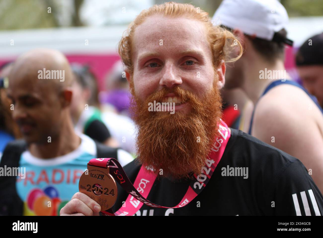 Russ (Russell) Cook of Great Britain finishes the Marathon at the 2024 ...