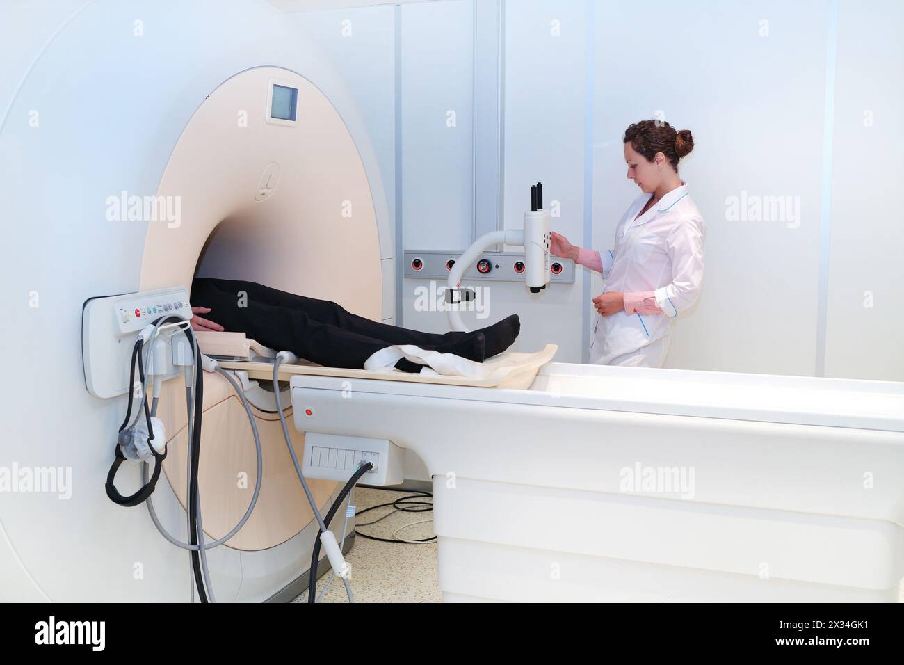 computerized axial tomography scanner in hospital with patient and ...