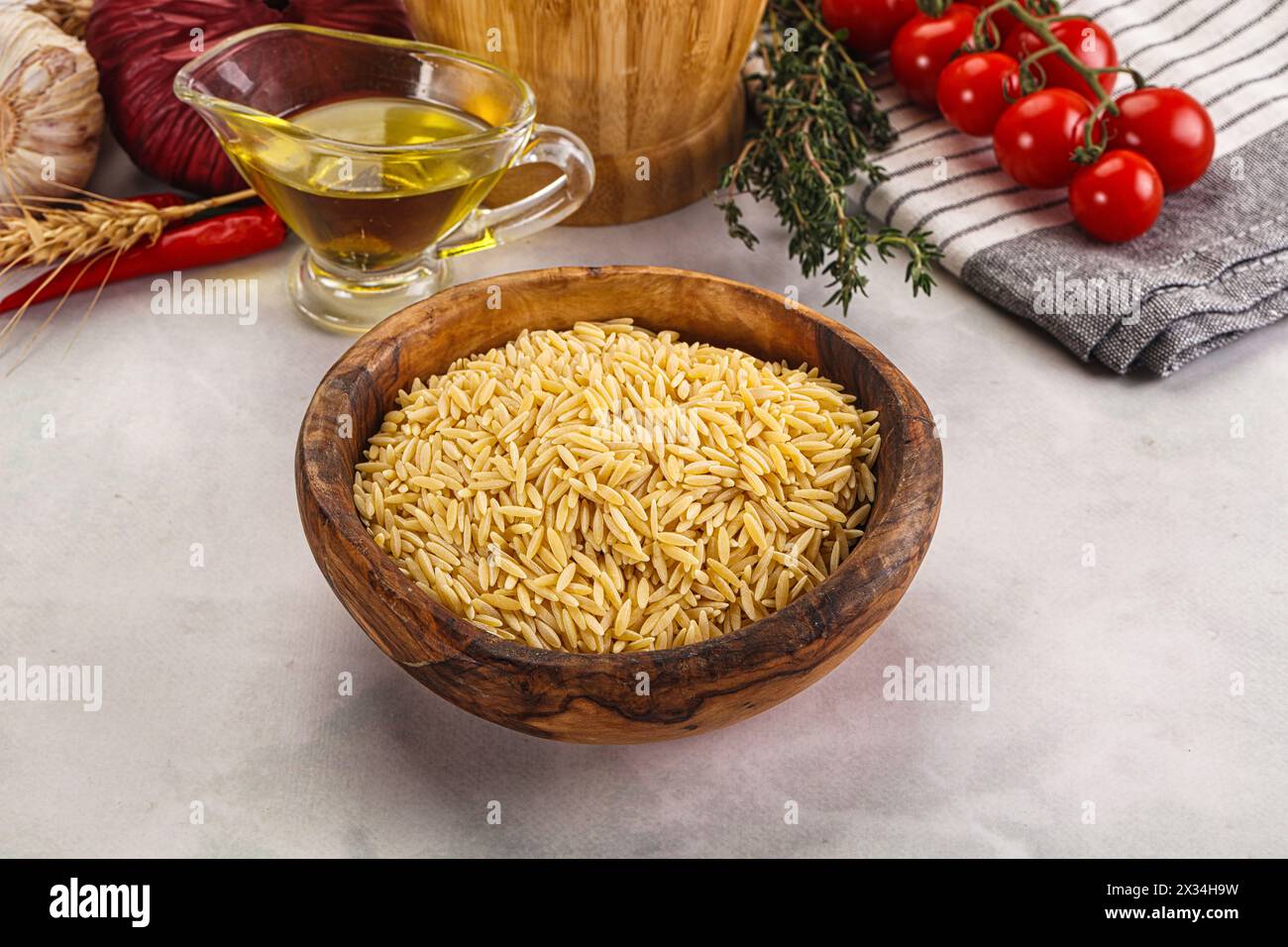 Italian raw dry pasta risoni for cooking Stock Photo - Alamy