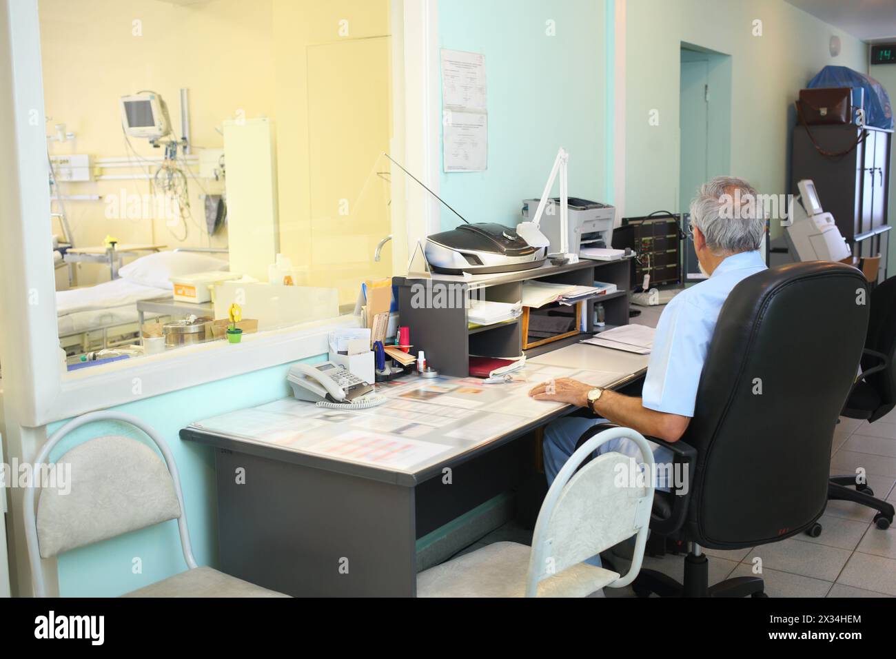 Workplace of the nurse and the viewing window in the intensive care ...