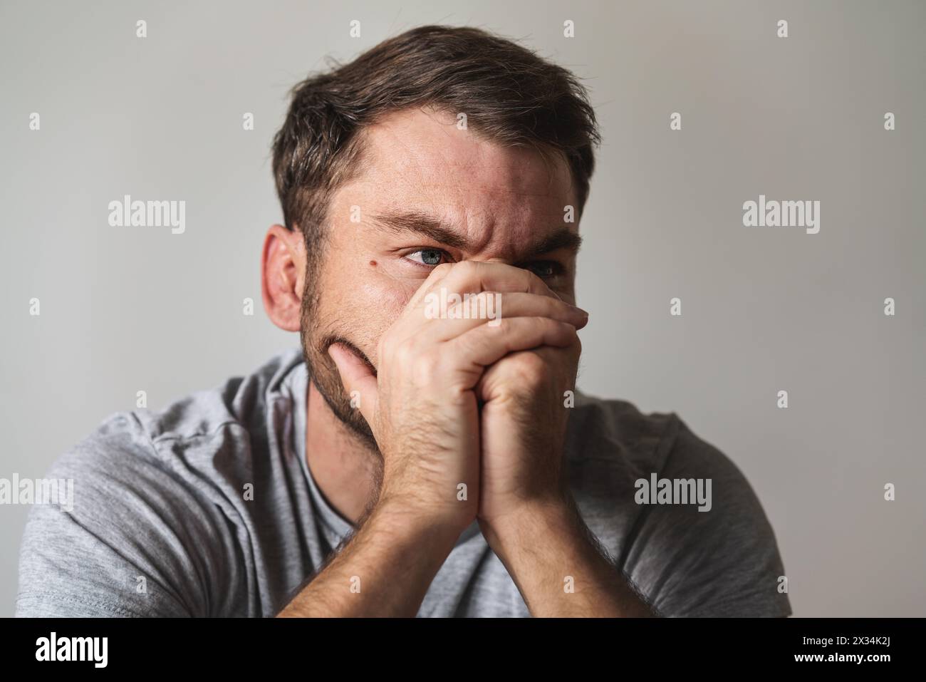 Stressed man covers his face with his hands closeup portrait. Mental ...