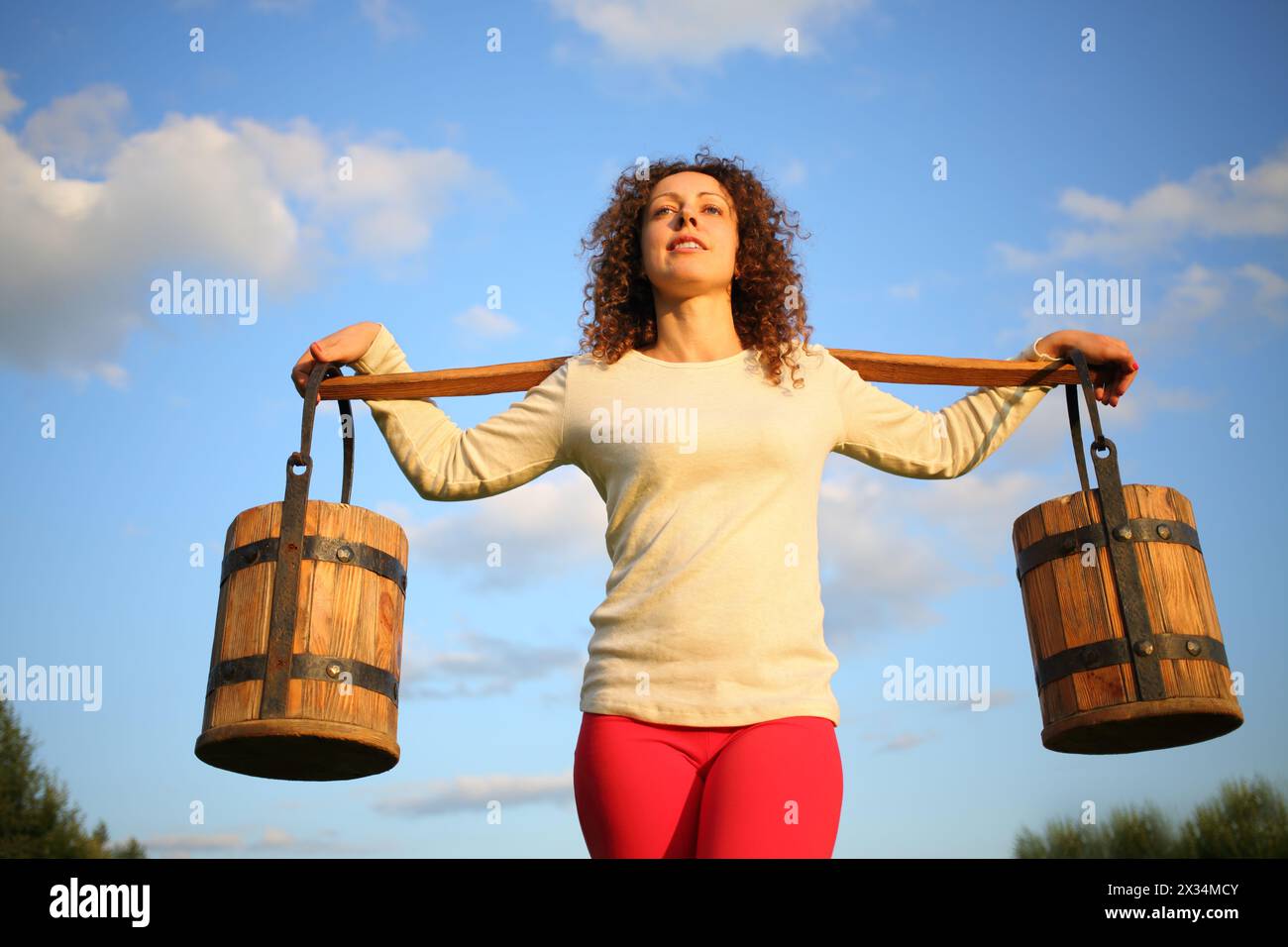 Woman with a yoke hi-res stock photography and images - Alamy
