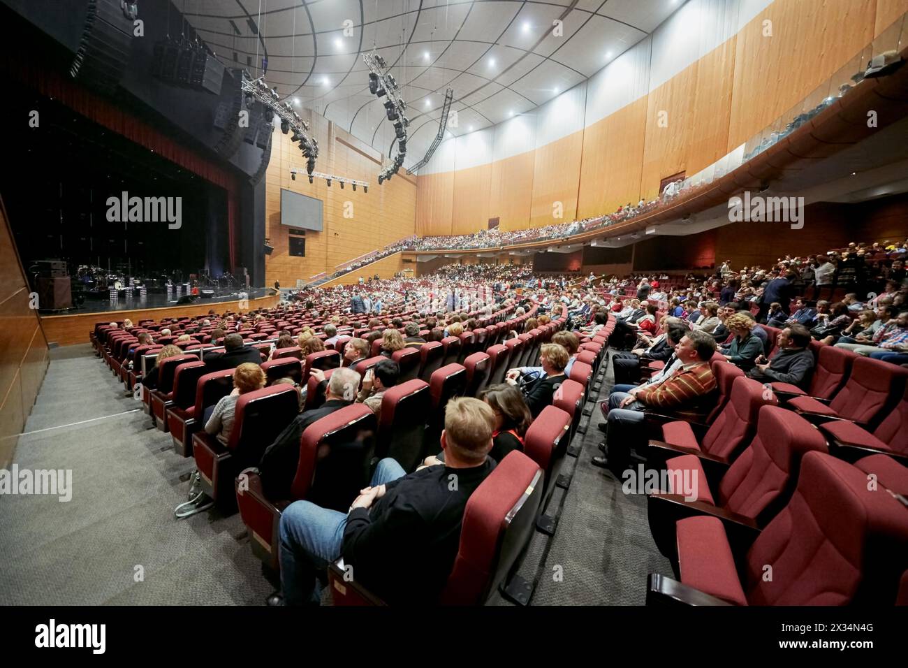 MOSCOW, RUSSIA - APR 24, 2015: People in armchairs in concert hall of ...