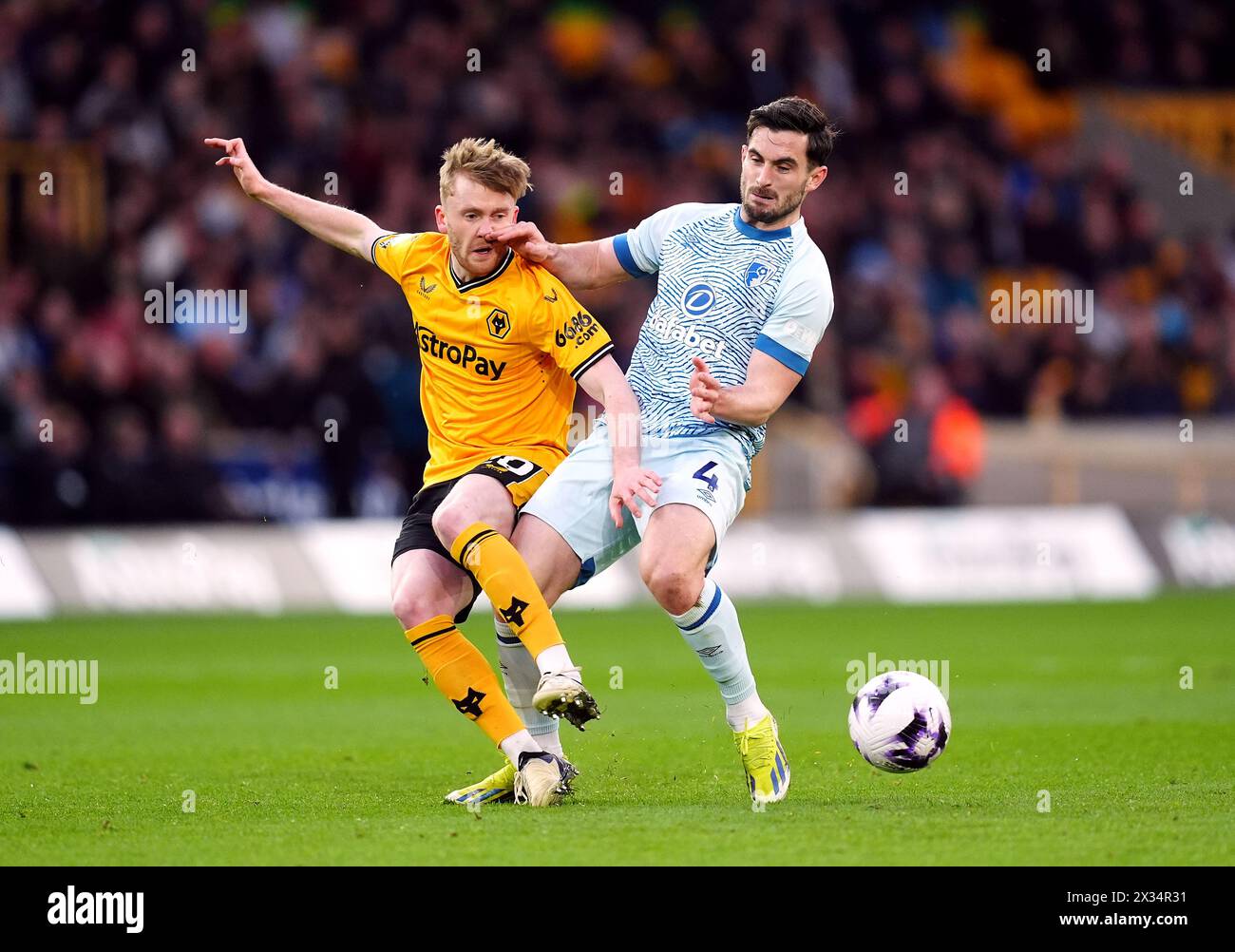Wolverhampton Wanderers' Tommy Doyle and Bournemouth's Lewis Cook ...