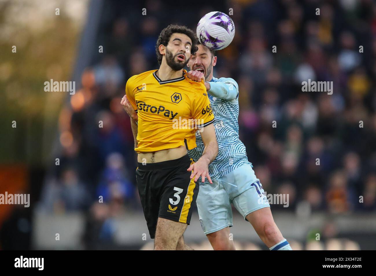 Rayan Aït-Nouri of Wolverhampton Wanderers jumps up to win the high ...
