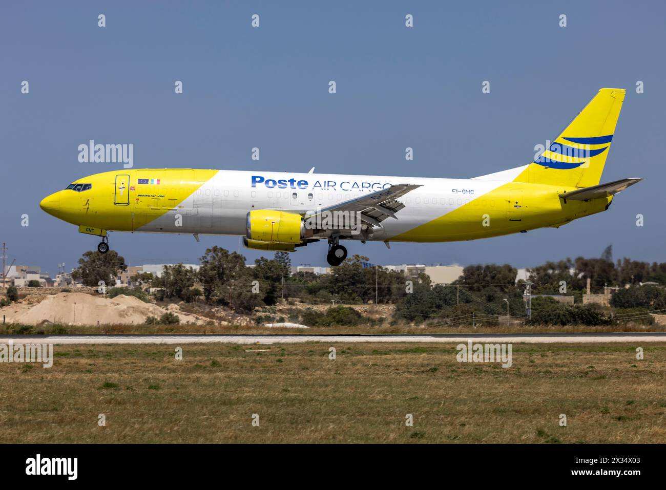 Poste Air Cargo Boeing 737-490(SF) (REG: EI-GHC) landing runway 31, cargo flight Stock Photo - Alamy