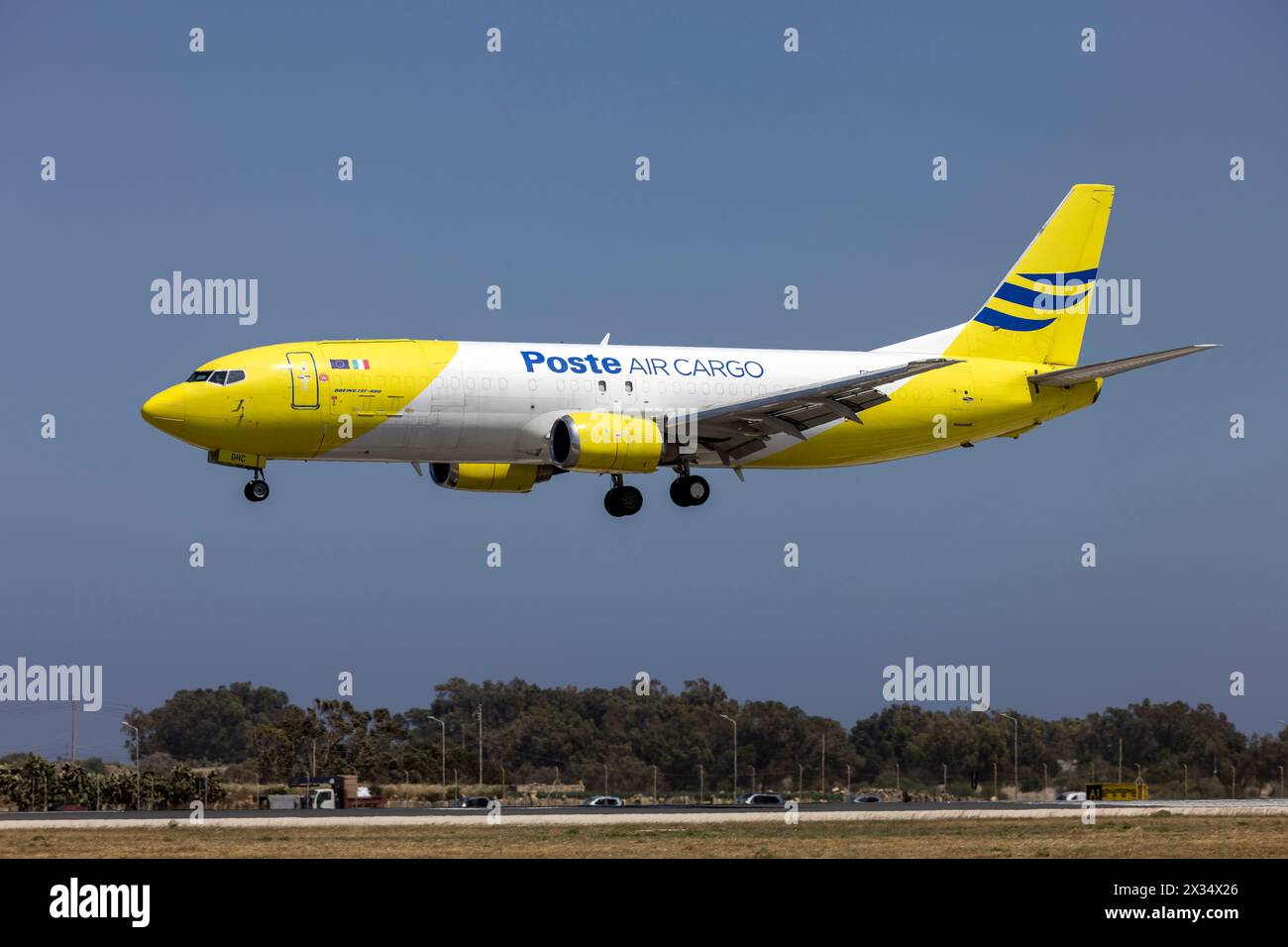 Poste Air Cargo Boeing 737-490(SF) (REG: EI-GHC) landing runway 31, cargo flight Stock Photo - Alamy