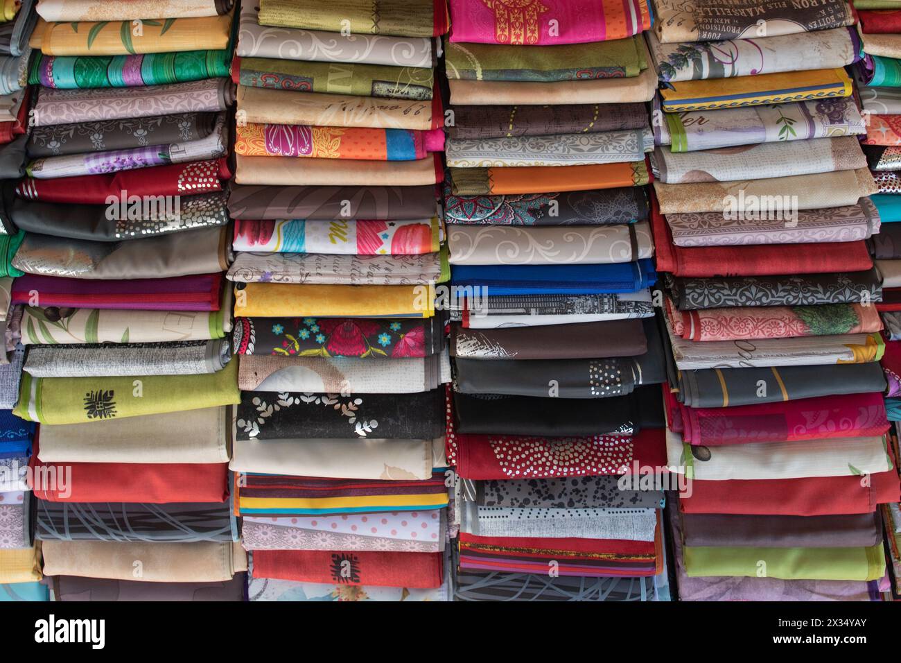 various fabrics stacked vertically Stock Photo - Alamy