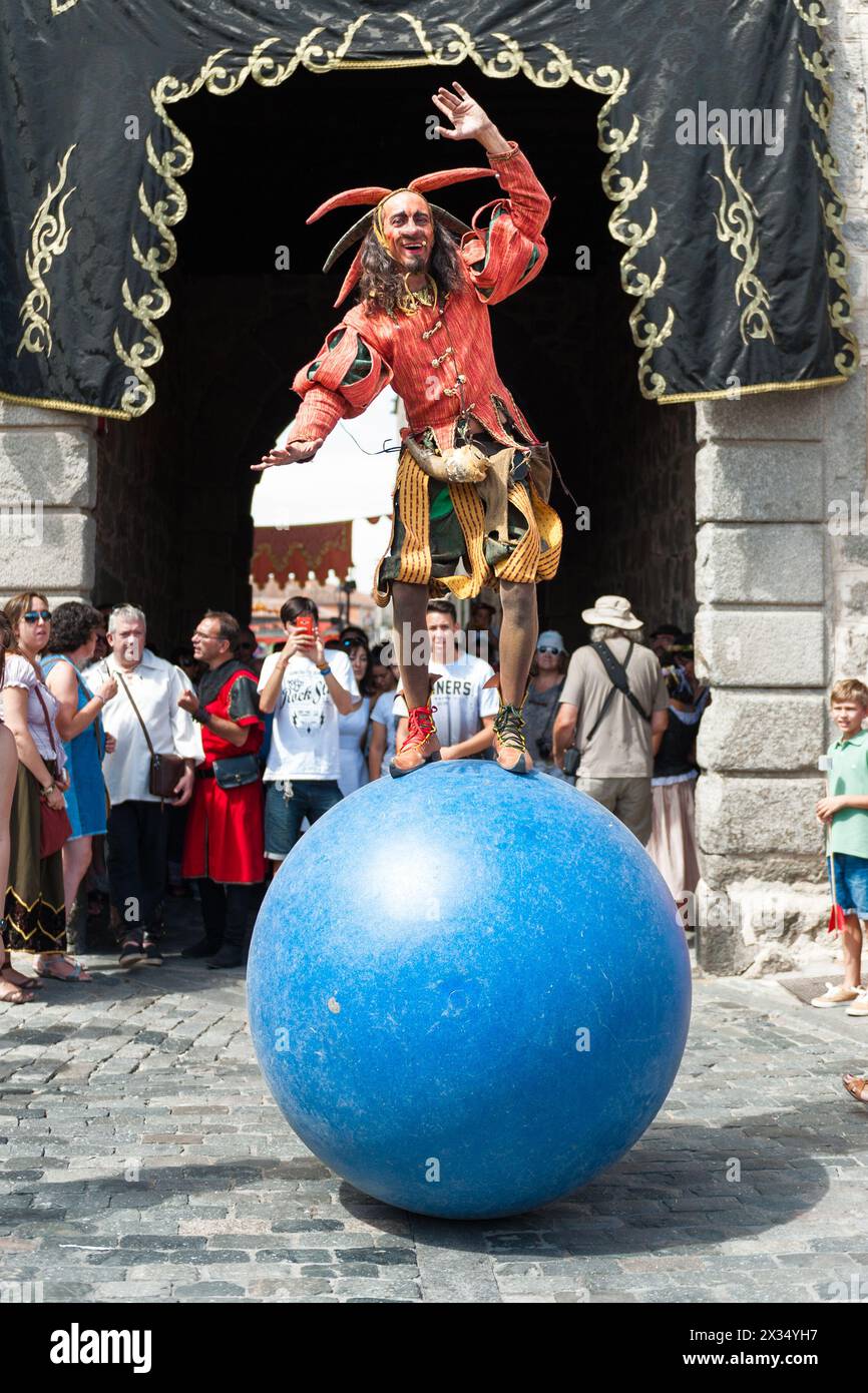 City of Avila, Spain, man dressed as jester juggling ball in the ...