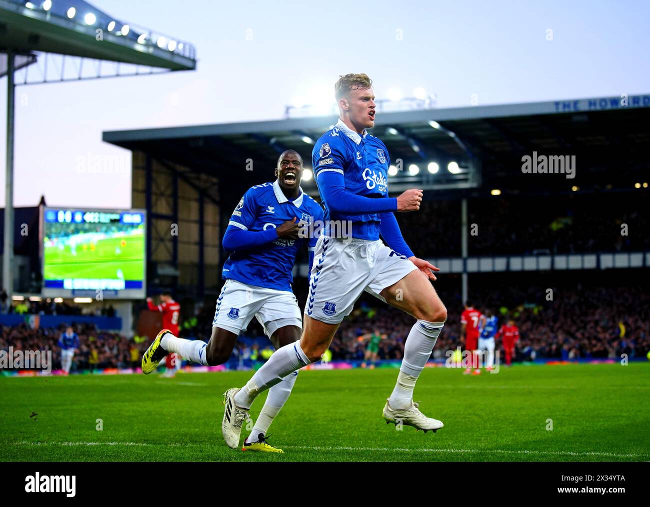 Everton's Jarrad Branthwaite (right) celebrates scoring their side's ...
