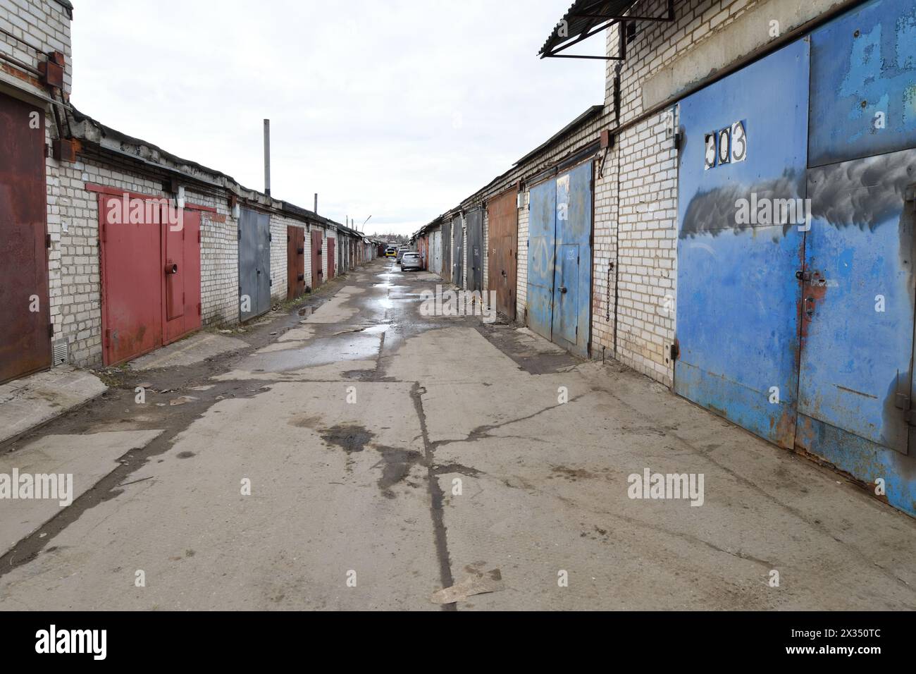 Brick garages with a metal gates of garage cooperative in Russia Stock ...