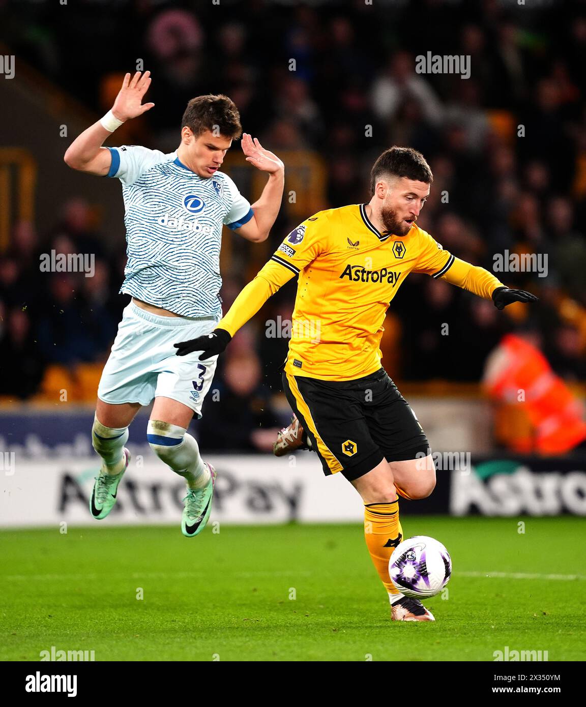 Bournemouth's Milos Kerkez (left) and Wolverhampton Wanderers' Matt ...