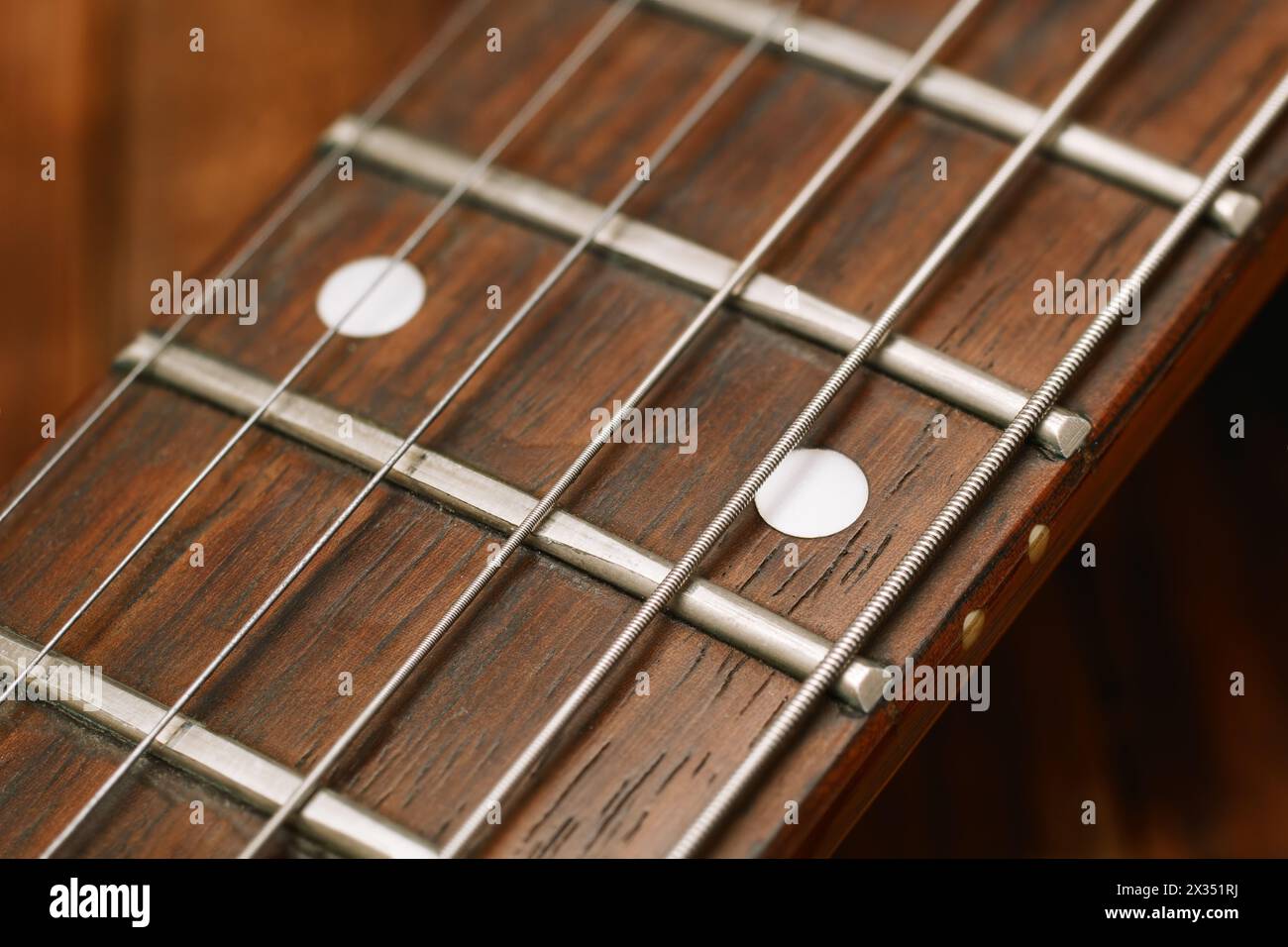 Closeup view of an electric guitar's fretboard Stock Photo - Alamy