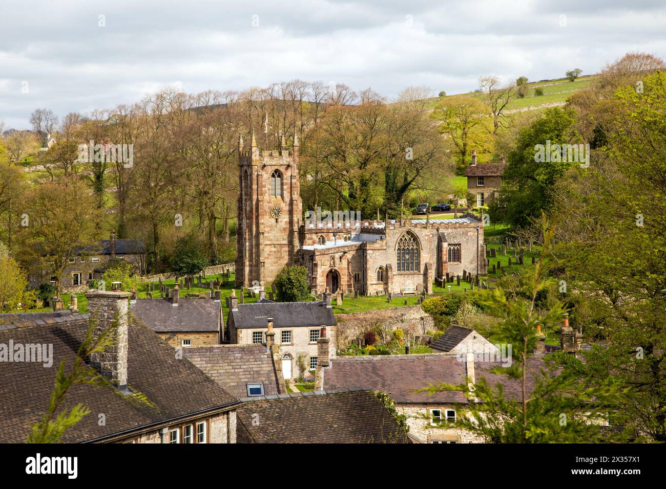 View over the Peak District Derbyshire village of Hartington with St ...
