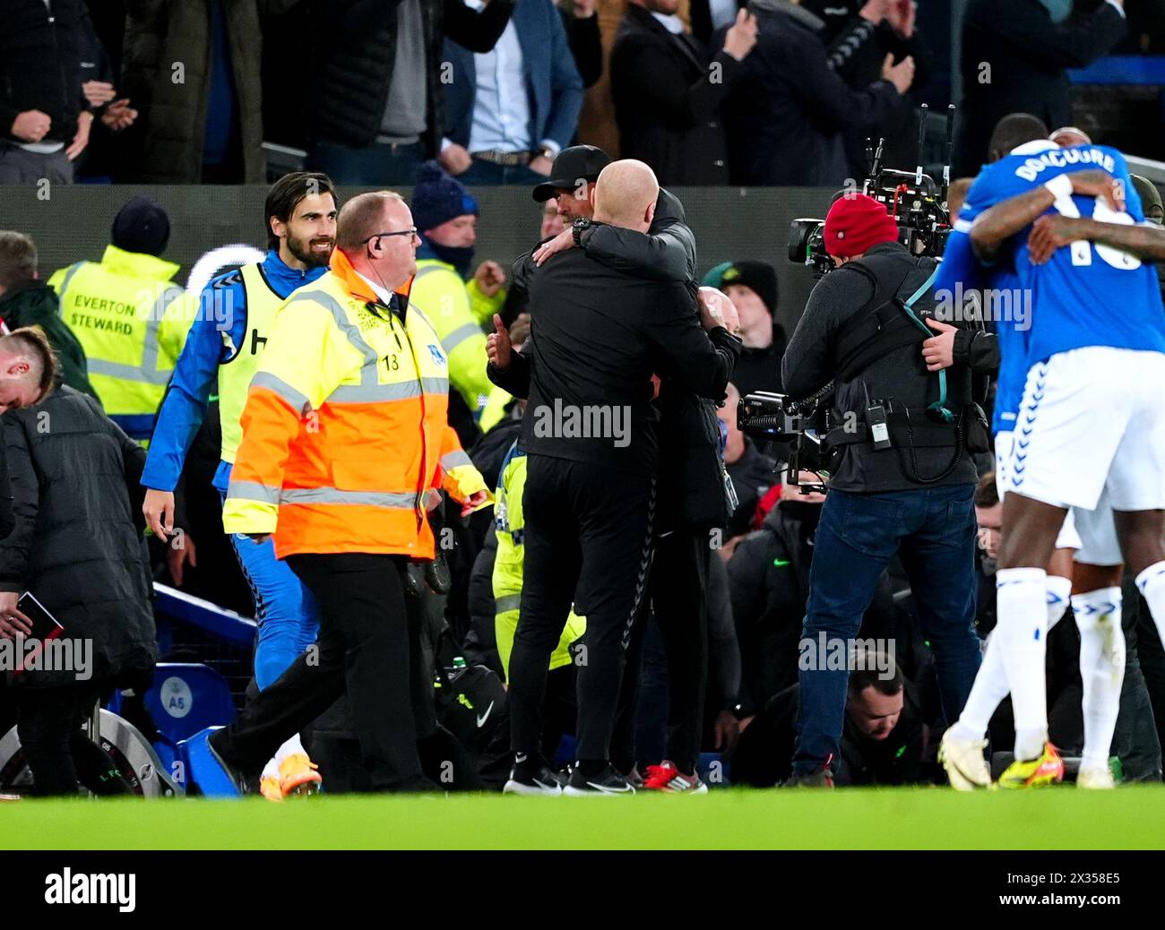 Everton manager Sean Dyche hugs Liverpool manager Jurgen Klopp at the ...