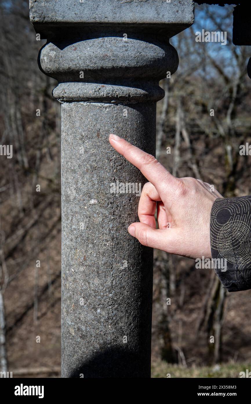 Pointing to the stone pillar, architecture and design Stock Photo - Alamy