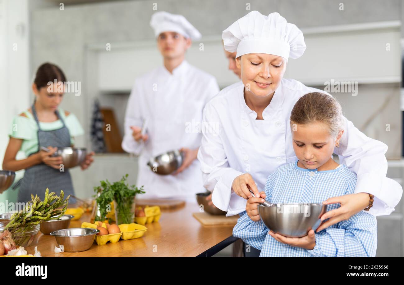 Teen boy cooking dinner hi-res stock photography and images - Alamy
