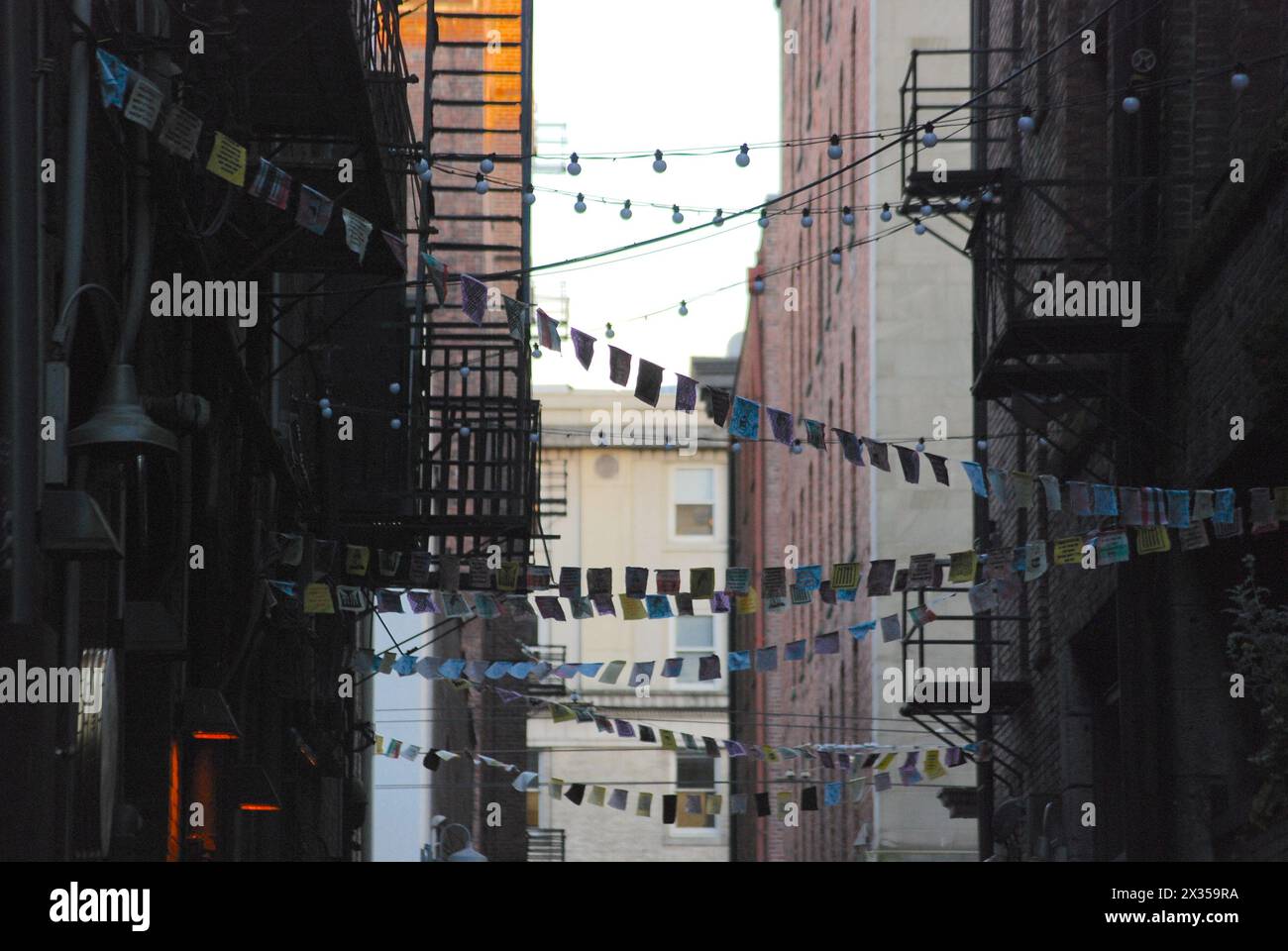 Seattle alley with prayer flags Stock Photo - Alamy