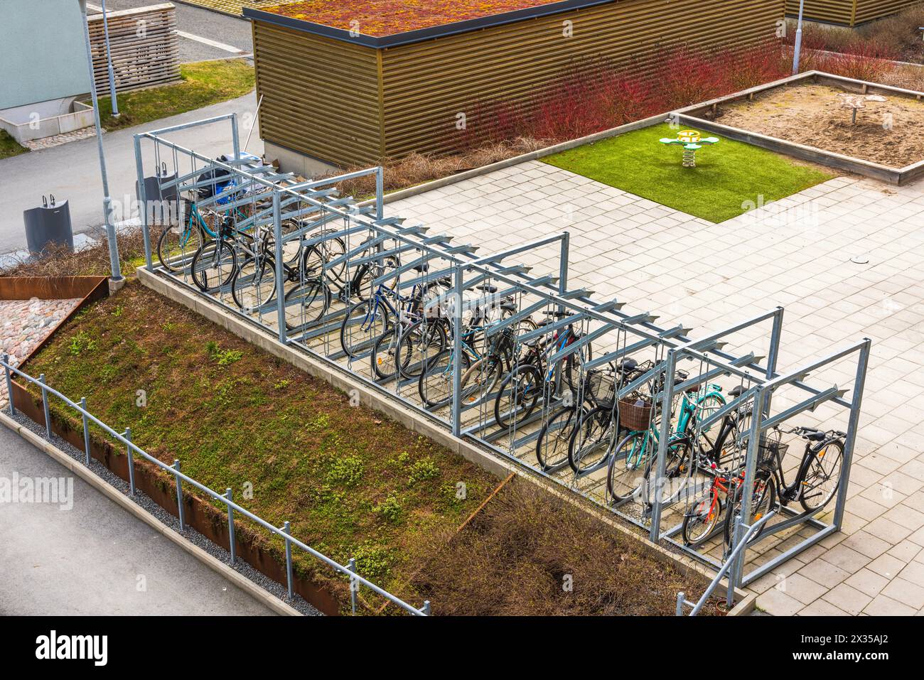 Close-up top-down view of the bicycle parking area in a modern ...