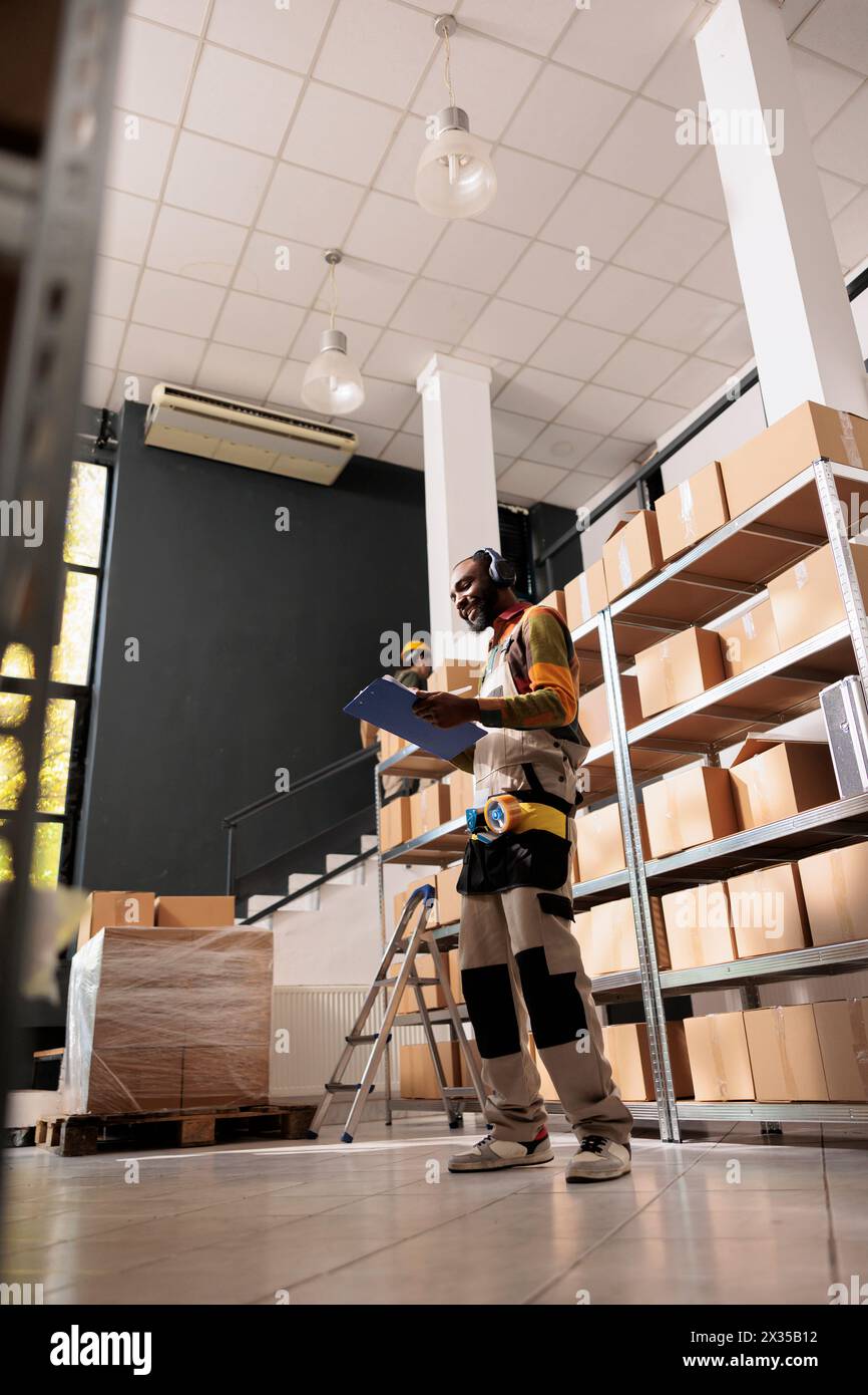 Warehouse employee having fun at work hi-res stock photography and ...