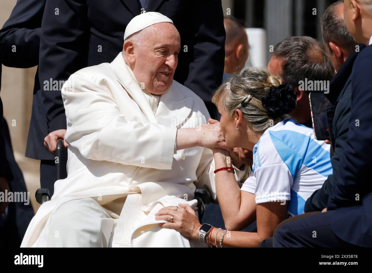 Vatican City, Vatican. 24th Apr, 2024. Pope Francis has his hand kissed ...