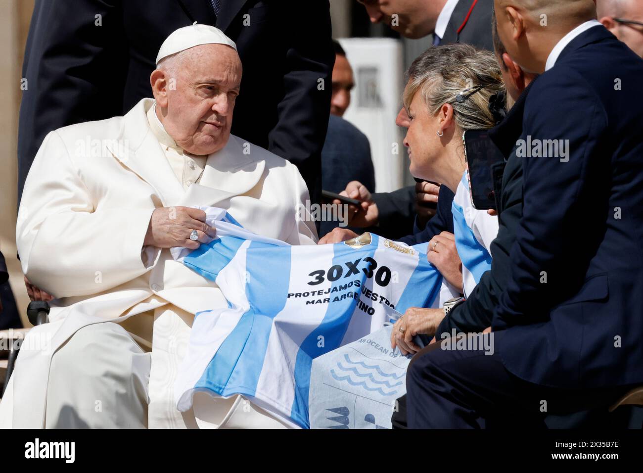 Vatican City, Vatican. 24th Apr, 2024. Pope Francis is given a jersey ...