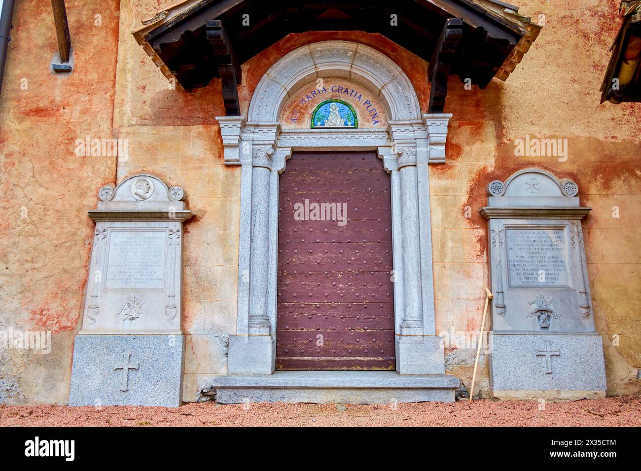 The entrance porch to the medieval San Maurizio Church in Lugano ...
