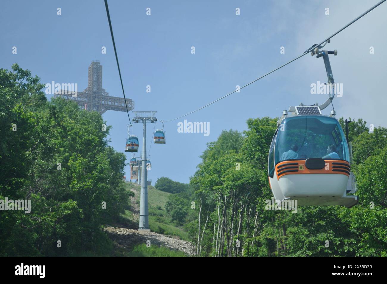Aerial view of cable car on Vodno mountain and background of capital ...