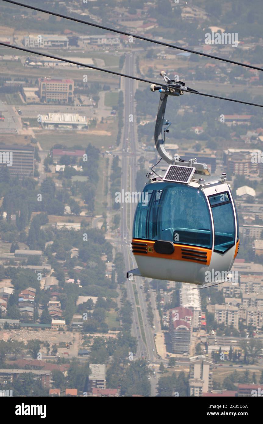 Aerial view of cable car on Vodno mountain and background of capital ...
