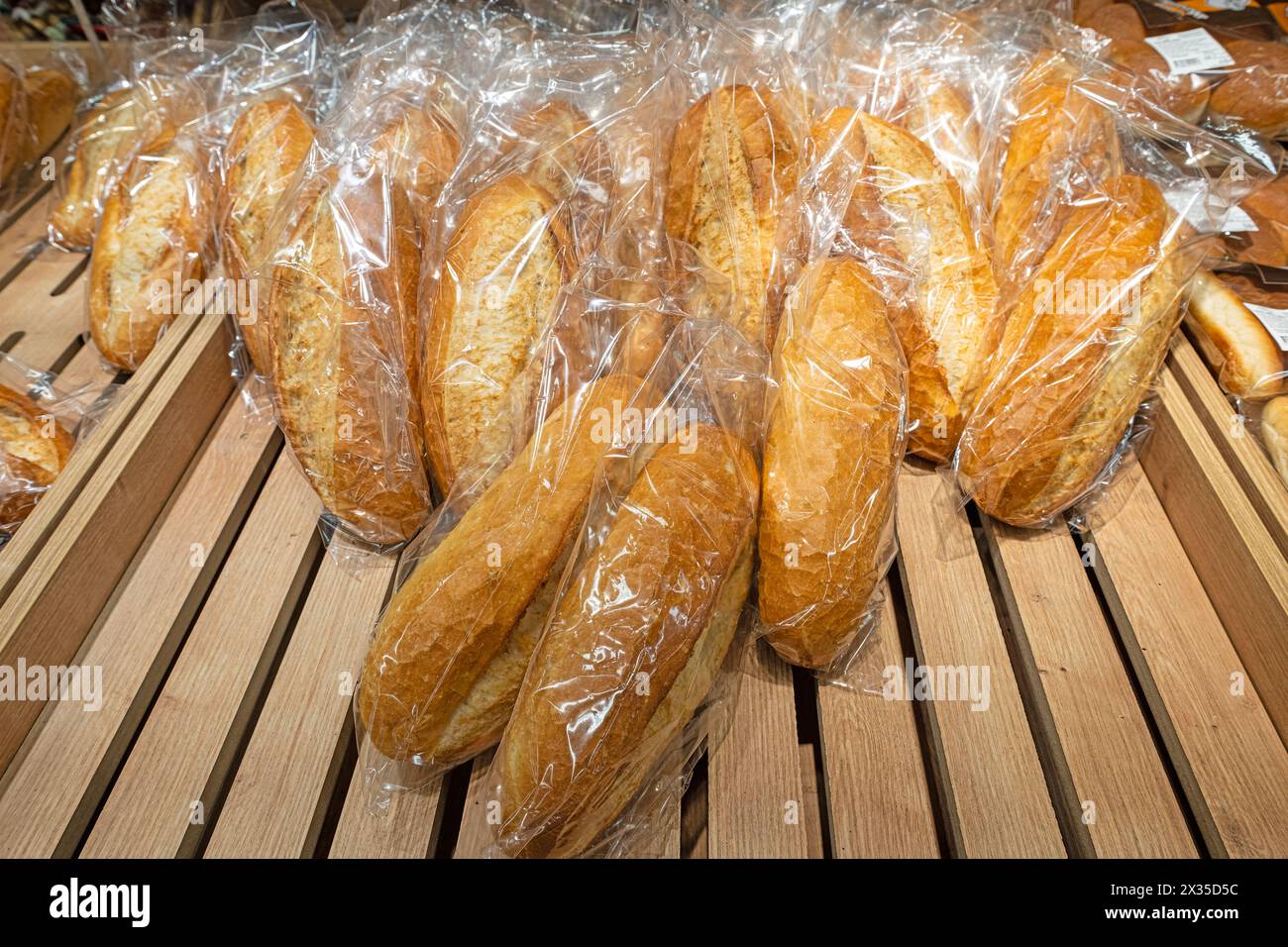 Bread sold in bags in the bakery section of the supermarket Stock Photo ...