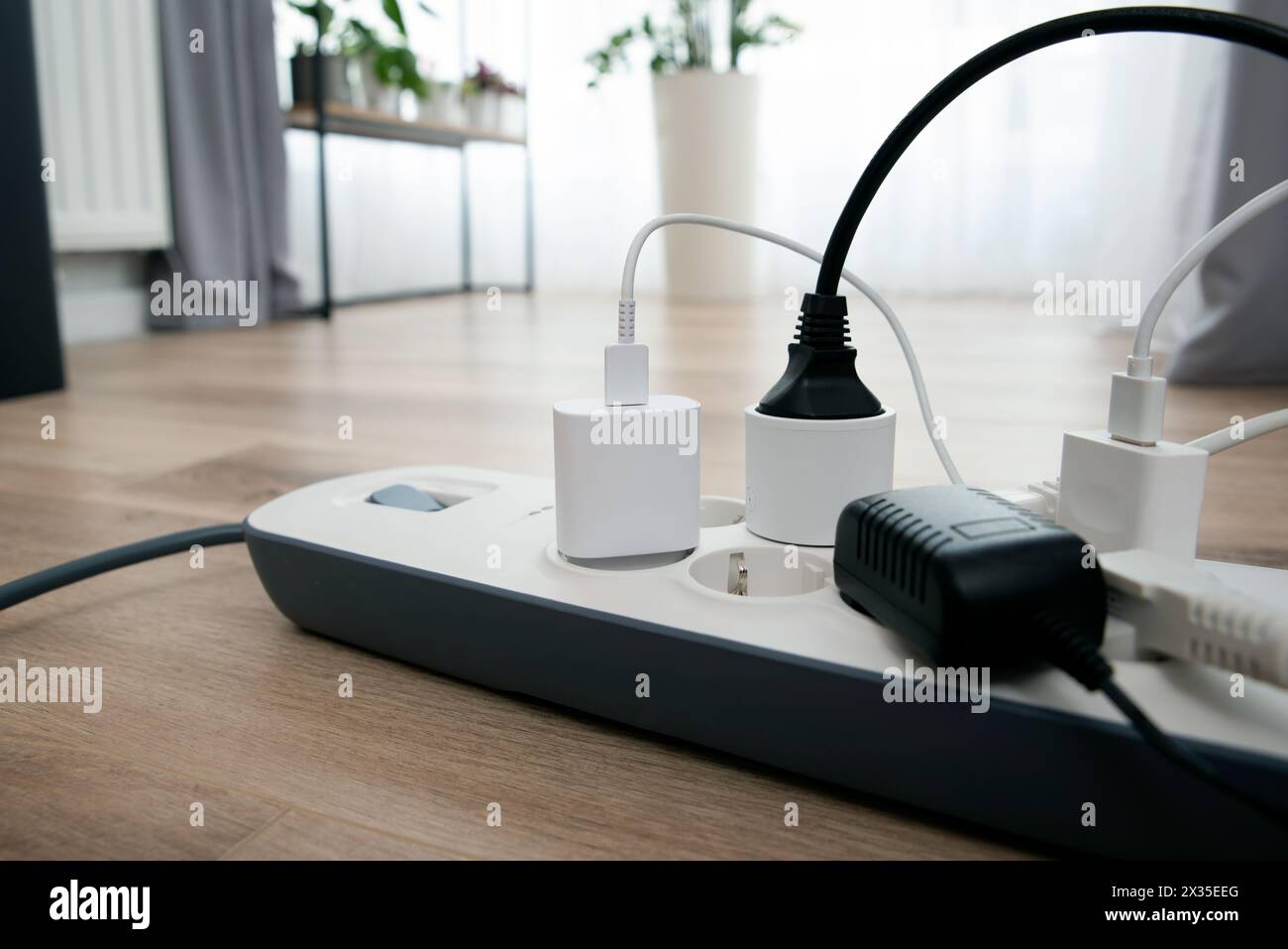 Electric power strip. Power plugs and a one multi socket electrical ...