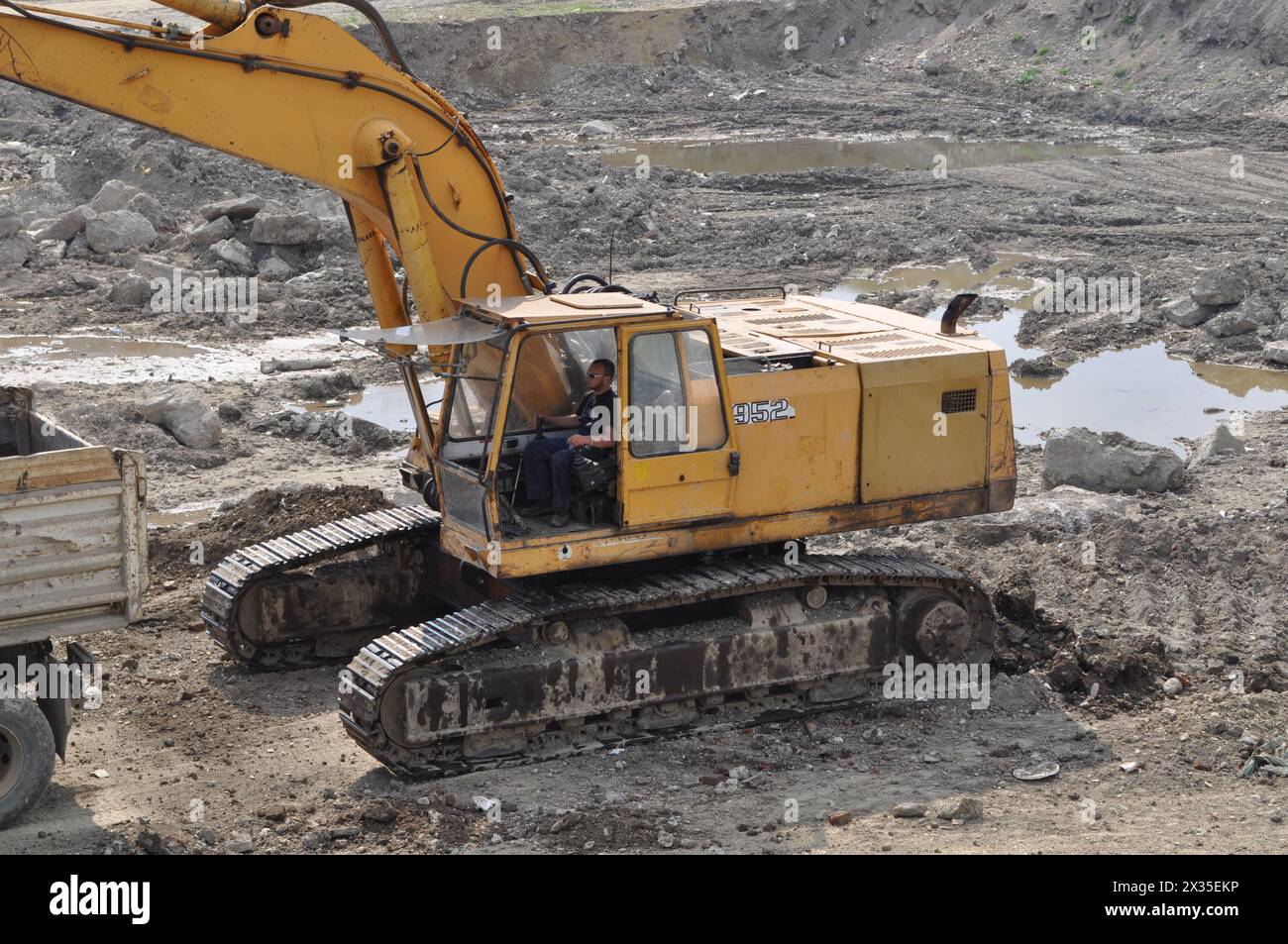 Excavator loads excavated soil hi-res stock photography and images - Alamy