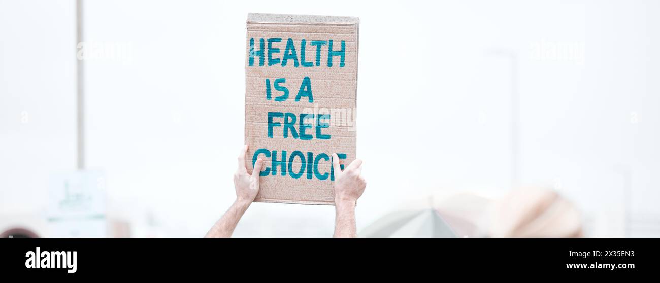 Person, hands and protest with billboard or sign for health, freedom or ...