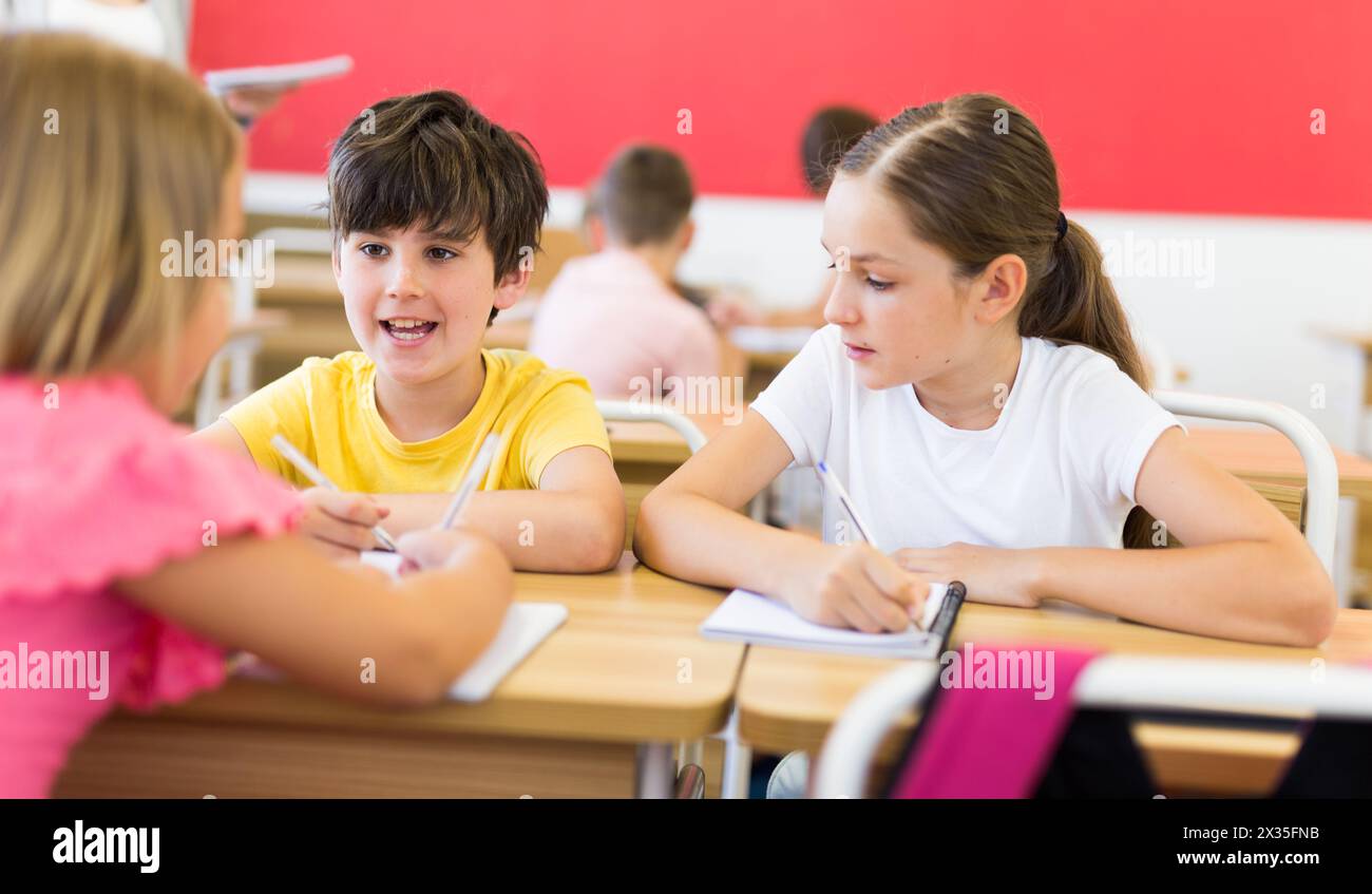 Children performing group tasks Stock Photo - Alamy