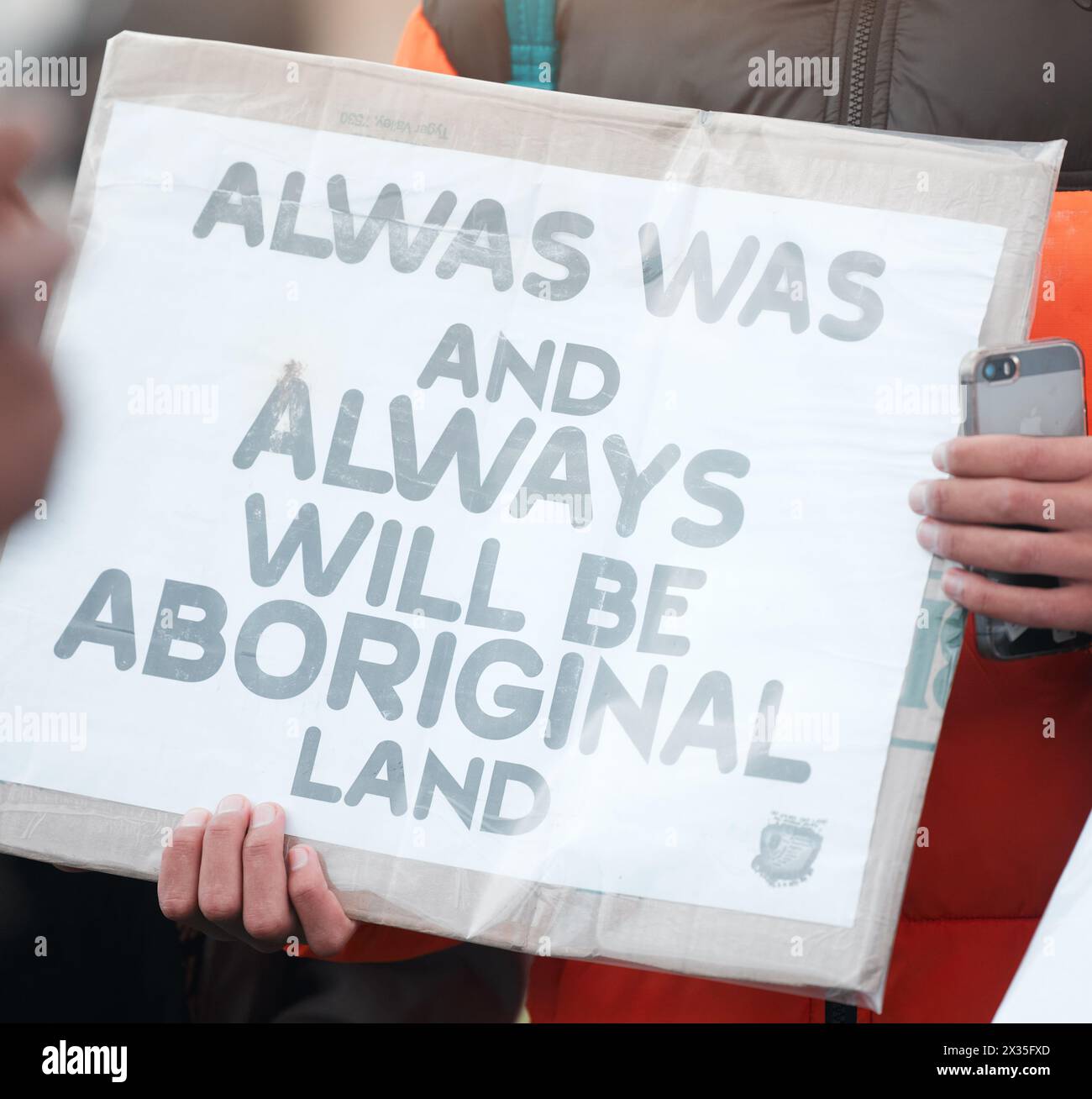 Person, protest and aboriginal with support, march and sign with ...