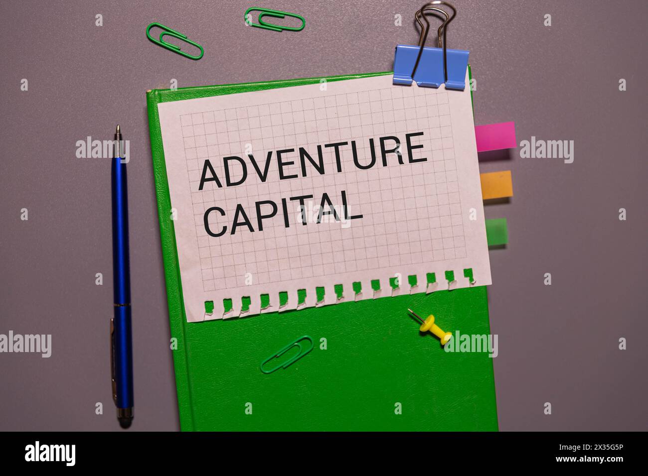 text Adventure Capital on white paper Stock Photo - Alamy