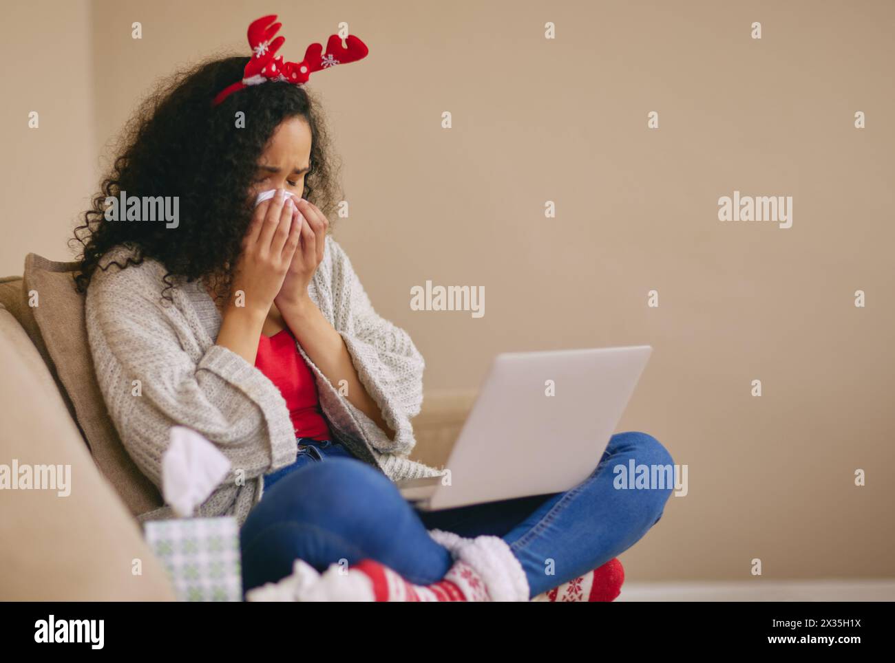 Christmas, sad and woman with laptop in home for watching videos ...