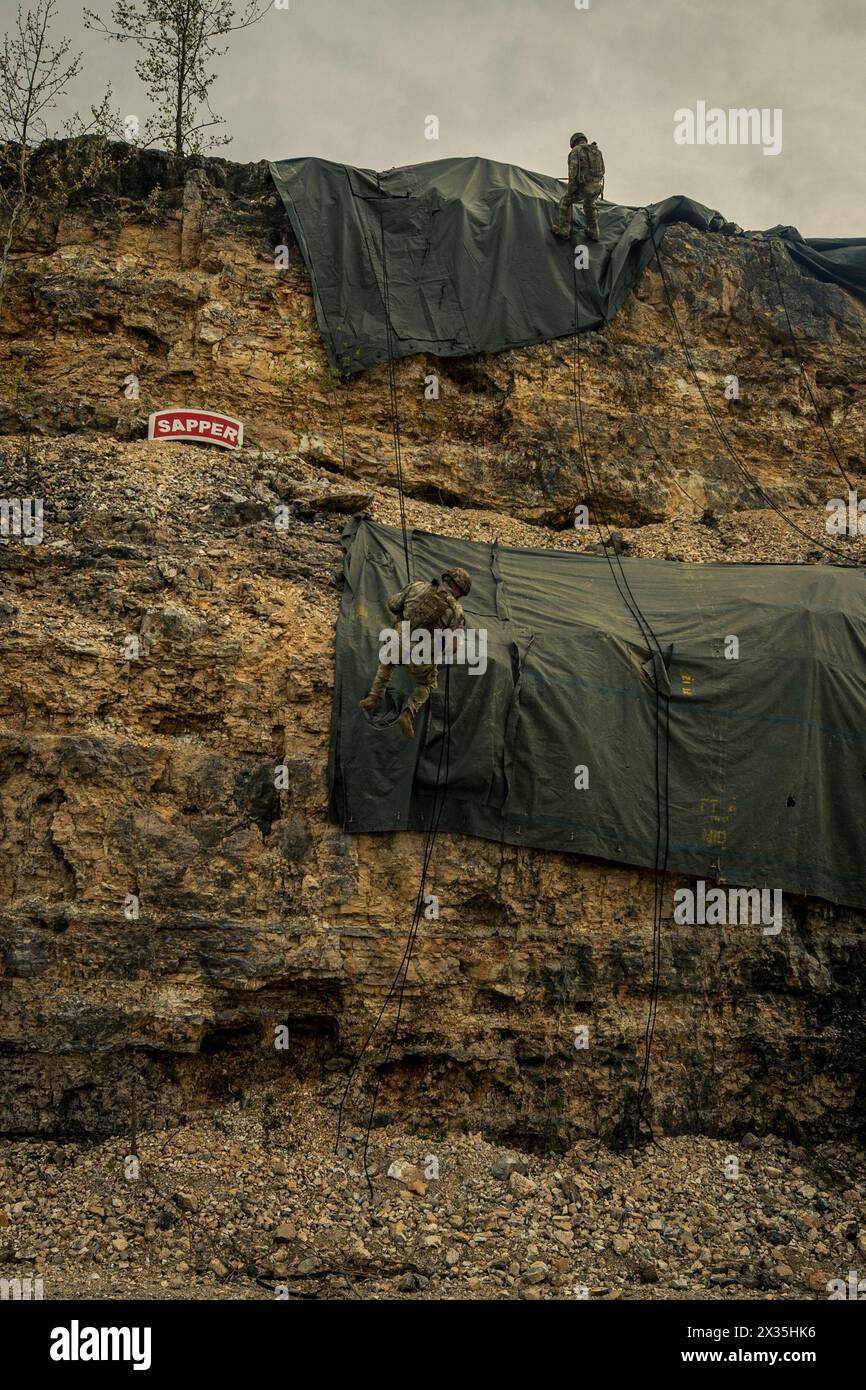 U.S. Army 1st Lt. John Scheerer (left), a Puyallup, Washington native ...