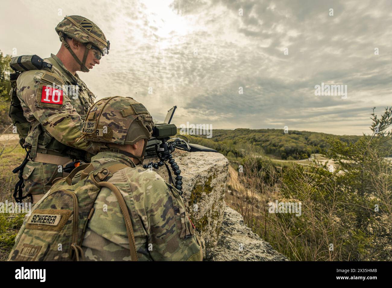 U.S. Army Staff Sgt. Nicholas Harris (left), an Urbana, Ohio native, a ...