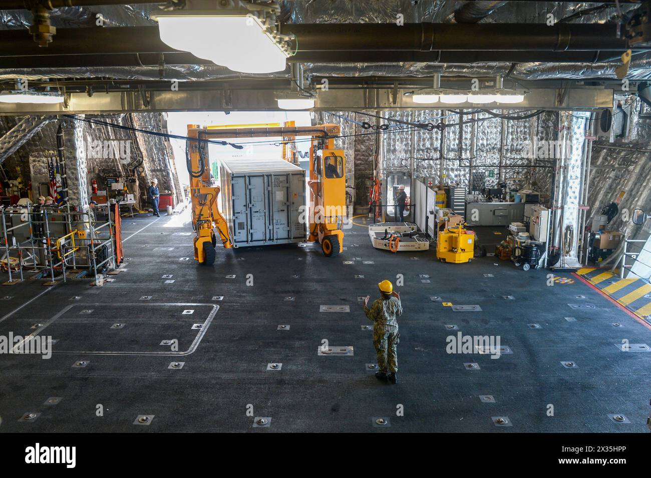 Boatswain Mate 3rd Class Deora Ledmitiituiasosopo (center), directs the ...