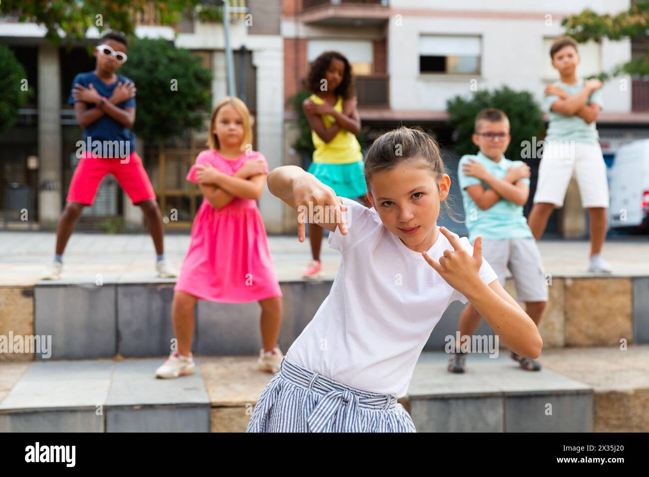 Young boys and girls dancing outdoors Stock Photo - Alamy