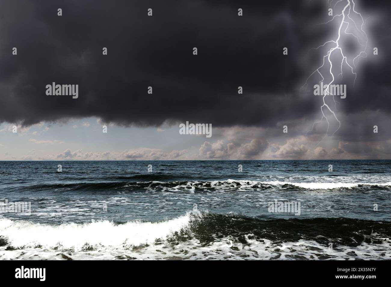Sea weather. Thunder cloud and lightning over water Stock Photo - Alamy