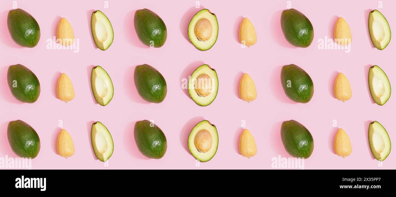 Many fresh ripe avocados on pink background. Pattern for design Stock ...