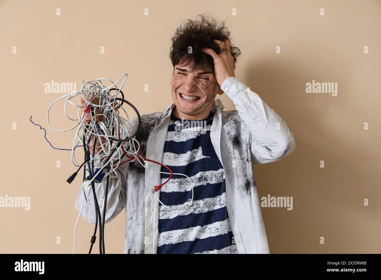 Electrocuted young man with burnt face on beige background Stock Photo ...