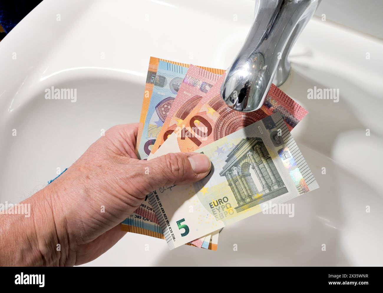 Symbol photo money laundering Stock Photo - Alamy