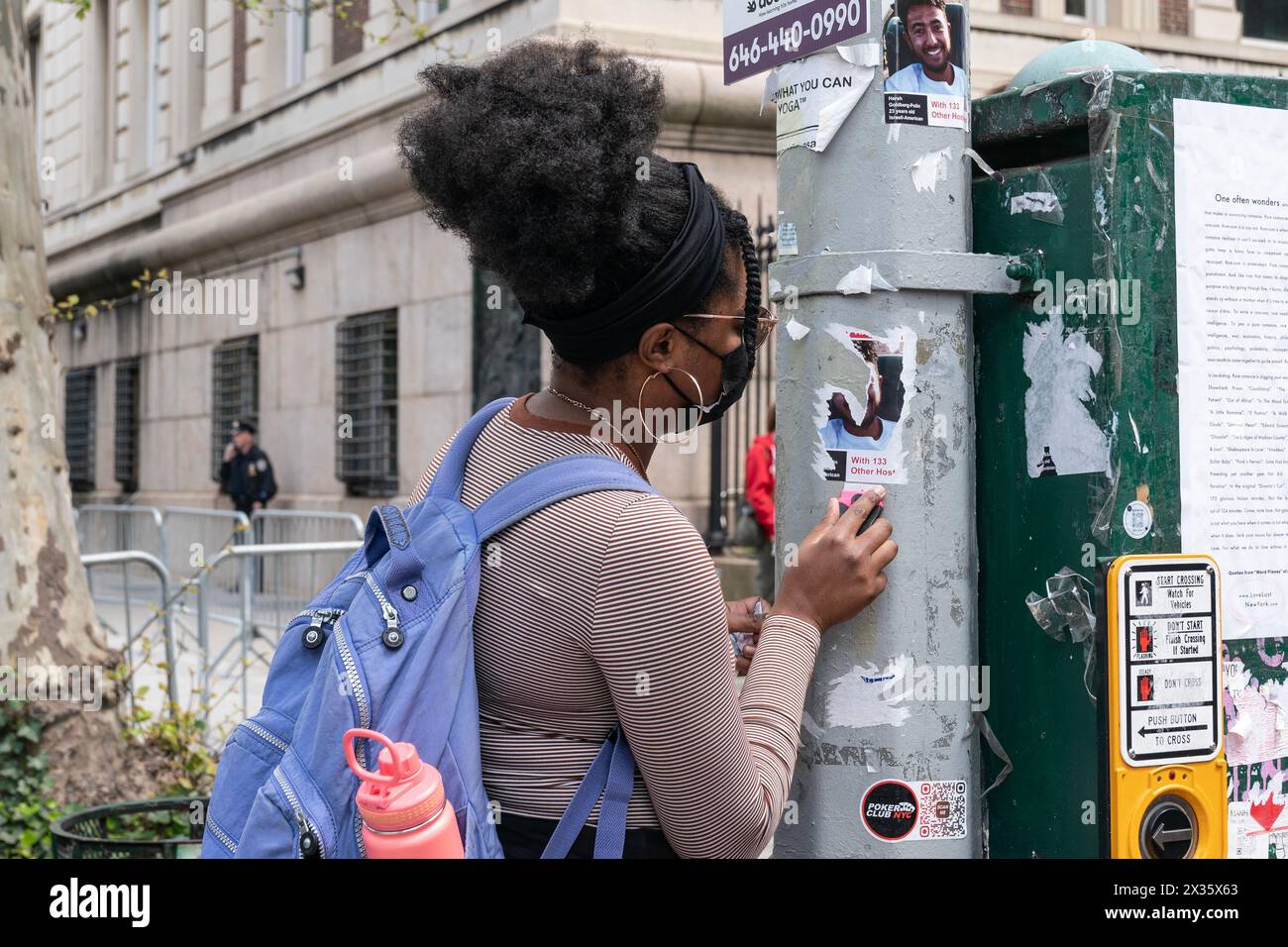 Activist rippes off poster of kidnapped by Hamas hostage as rally held ...