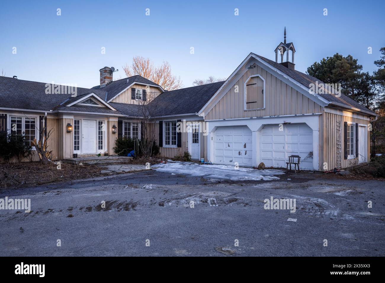 The exterior of a large abandoned house. This House has since been ...