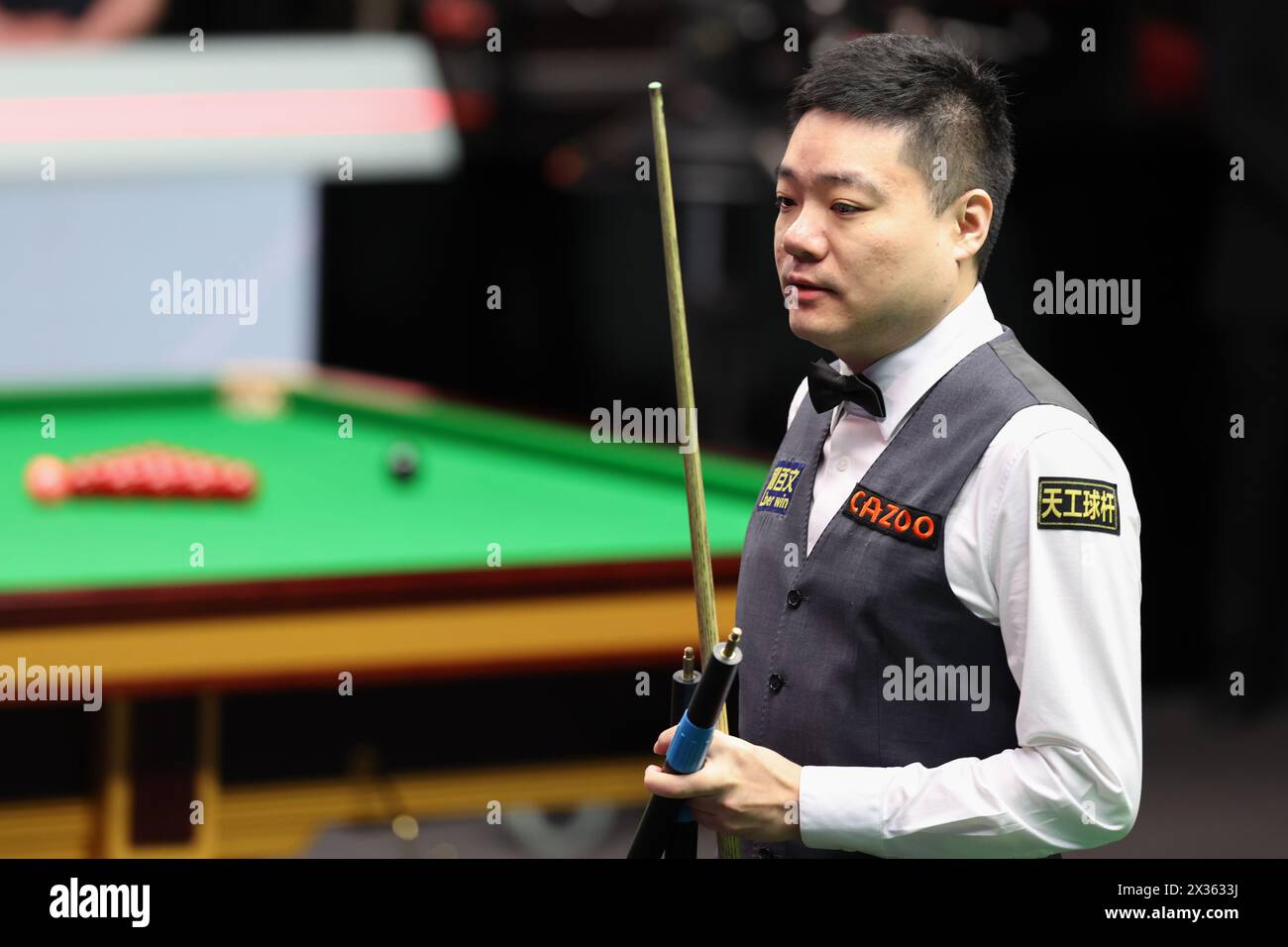 Sheffield, Britain. 24th Apr, 2024. Ding Junhui of China reacts during ...